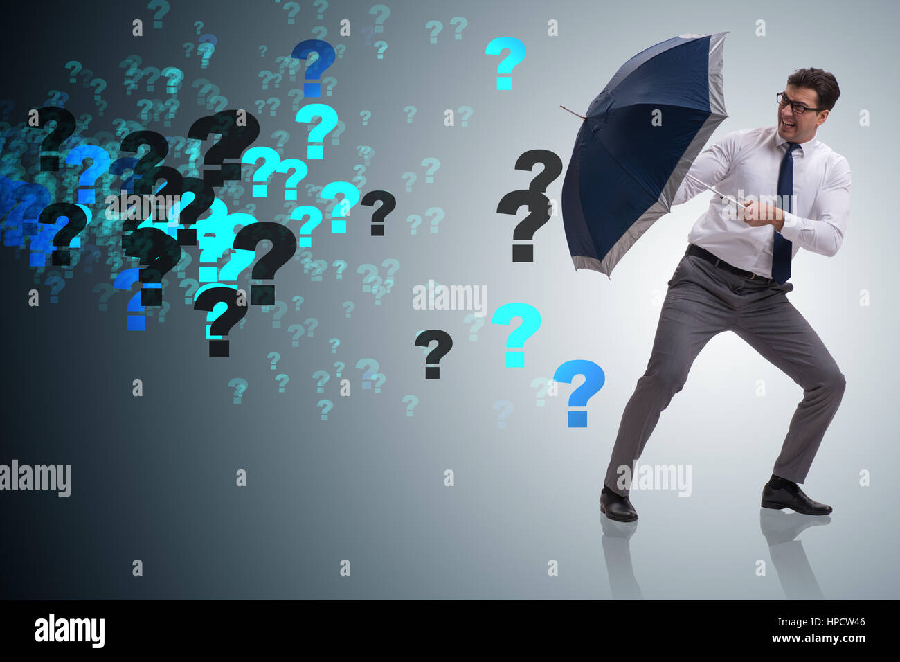 Uncertainty concept with businessman and question marks Stock Photo - Alamy