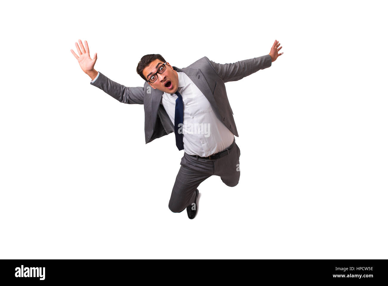 Falling businessman isolated on the white background Stock Photo - Alamy