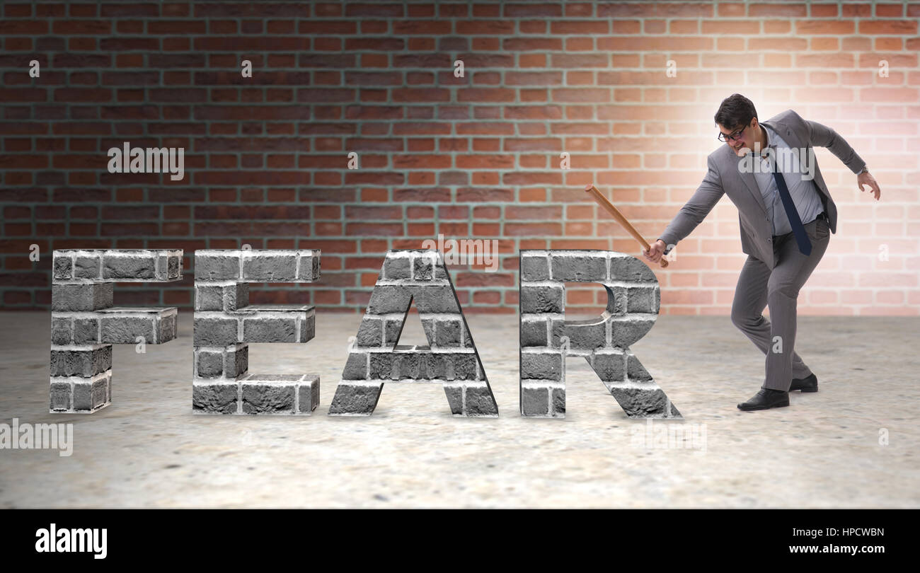 Angry man with baseball bat hitting fear word Stock Photo - Alamy
