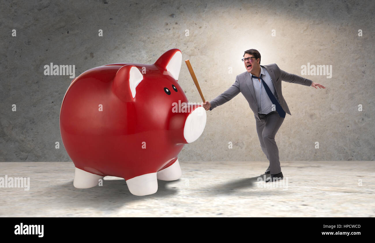 Angry man with baseball bat hitting piggybank Stock Photo - Alamy