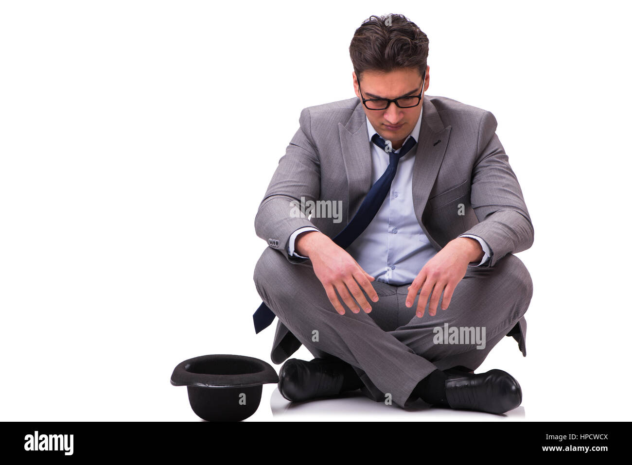 Bankrupt businessman isolated on white background Stock Photo - Alamy