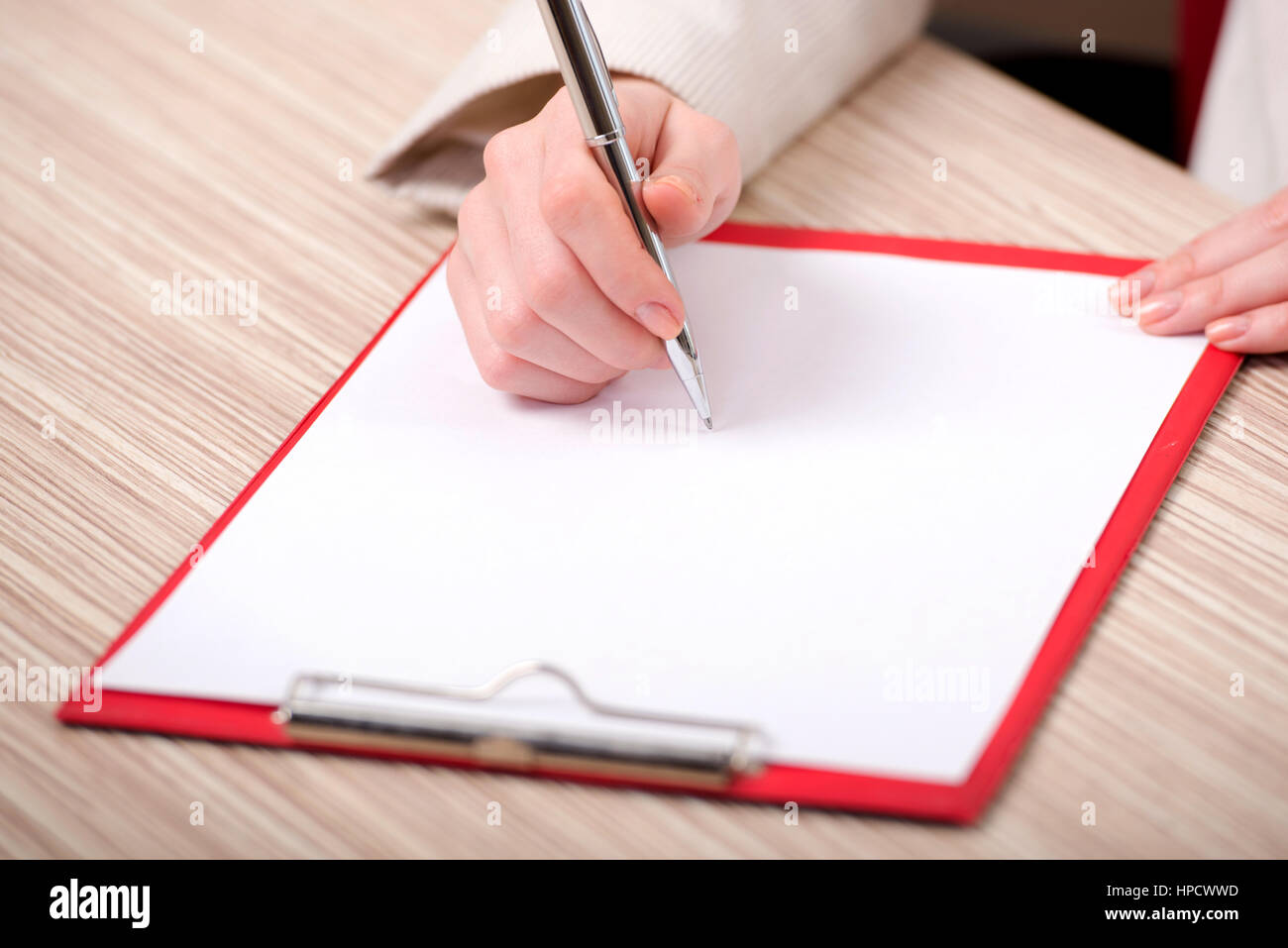 Hands taking notes in the pad Stock Photo - Alamy
