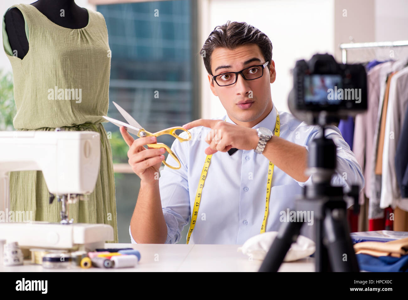 Young man working as fashion video blogger Stock Photo - Alamy