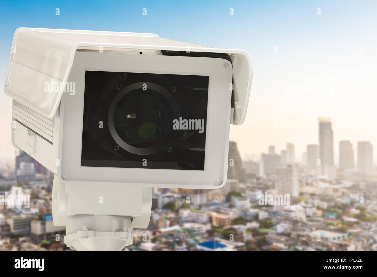 3d rendering cctv camera or security camera on cityscape background ...