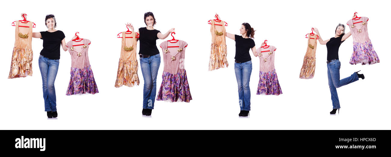 Woman trying to choose dress on white Stock Photo - Alamy