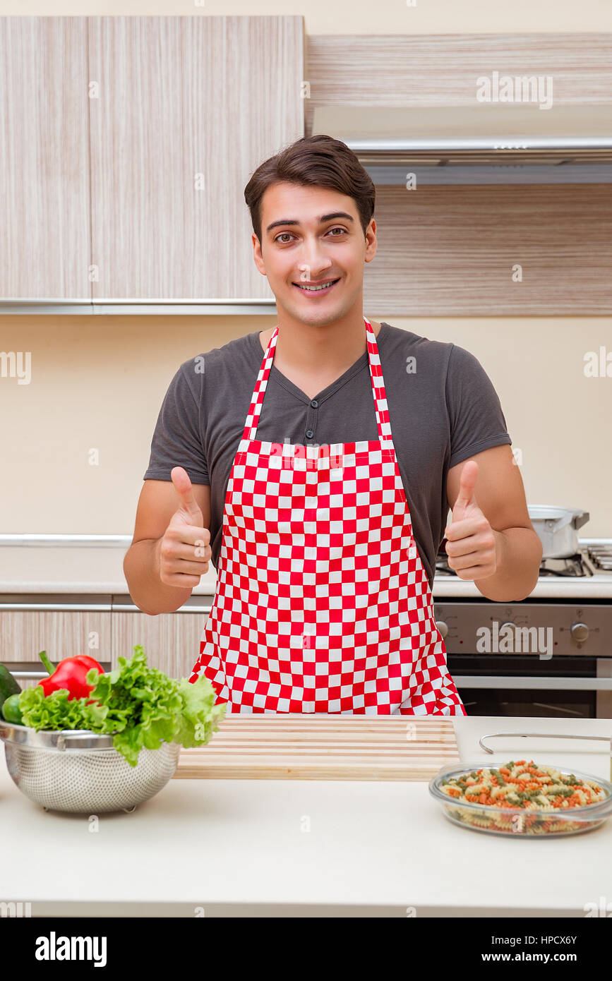 Man male cook preparing food in kitchen Stock Photo - Alamy