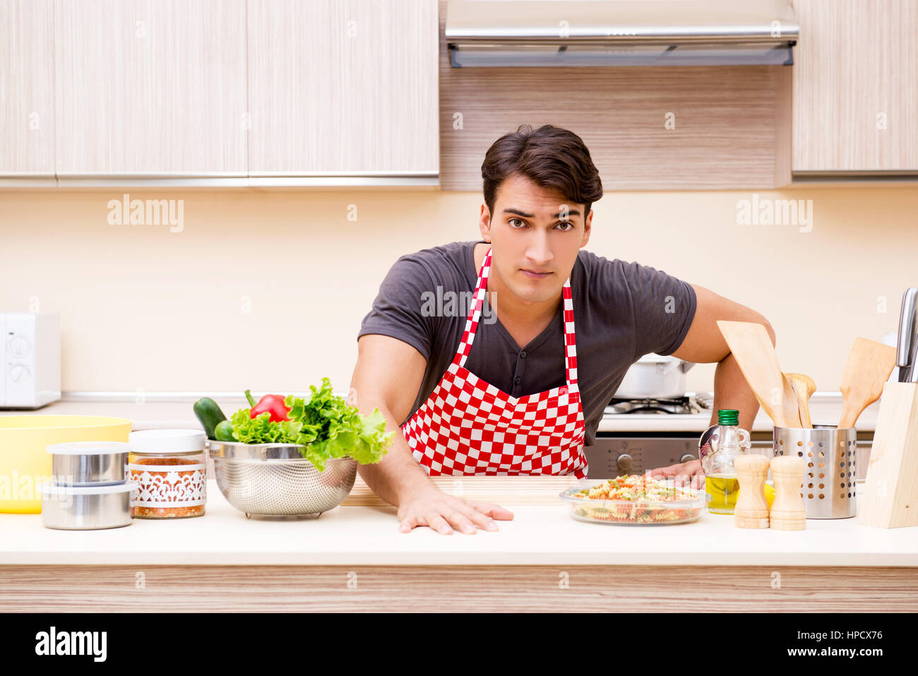Man male cook preparing food in kitchen Stock Photo - Alamy
