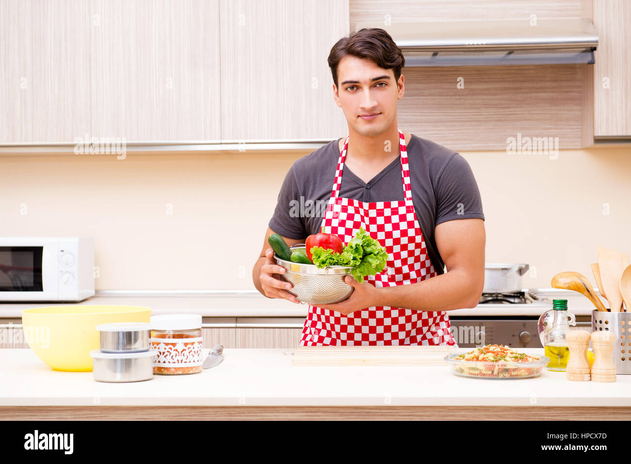 Man male cook preparing food in kitchen Stock Photo - Alamy