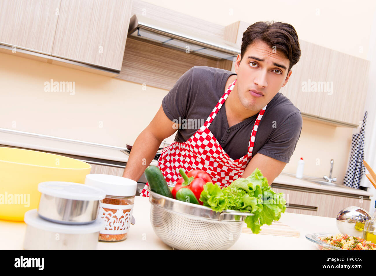 Man male cook preparing food in kitchen Stock Photo - Alamy