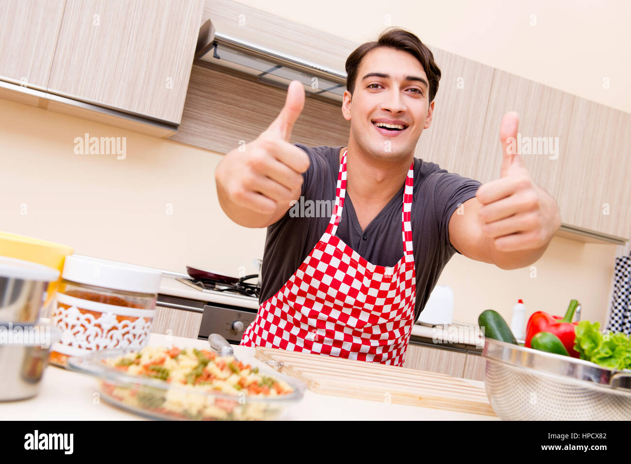 Man male cook preparing food in kitchen Stock Photo - Alamy