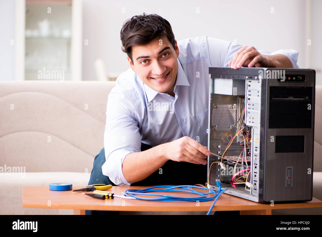 IT technician repairing broken pc desktop computer Stock Photo - Alamy