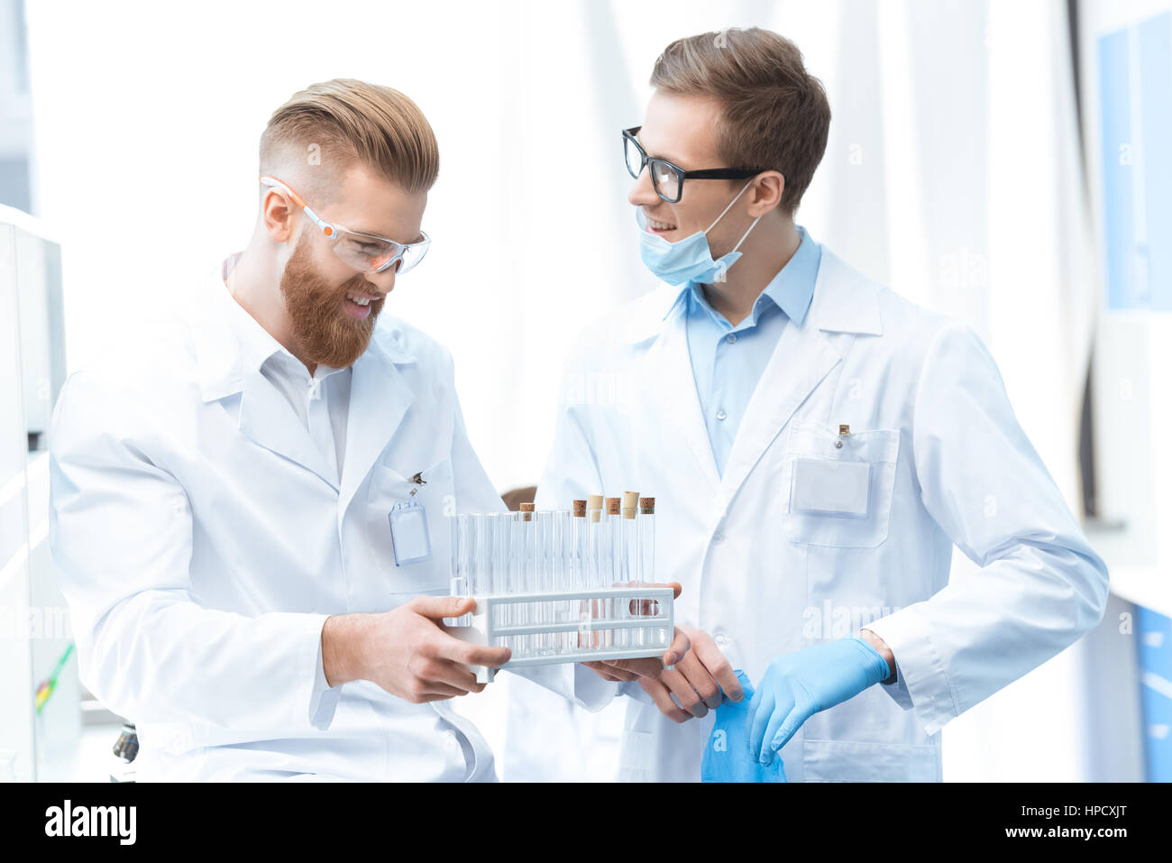 Men in laboratory with test tubes hi-res stock photography and images ...