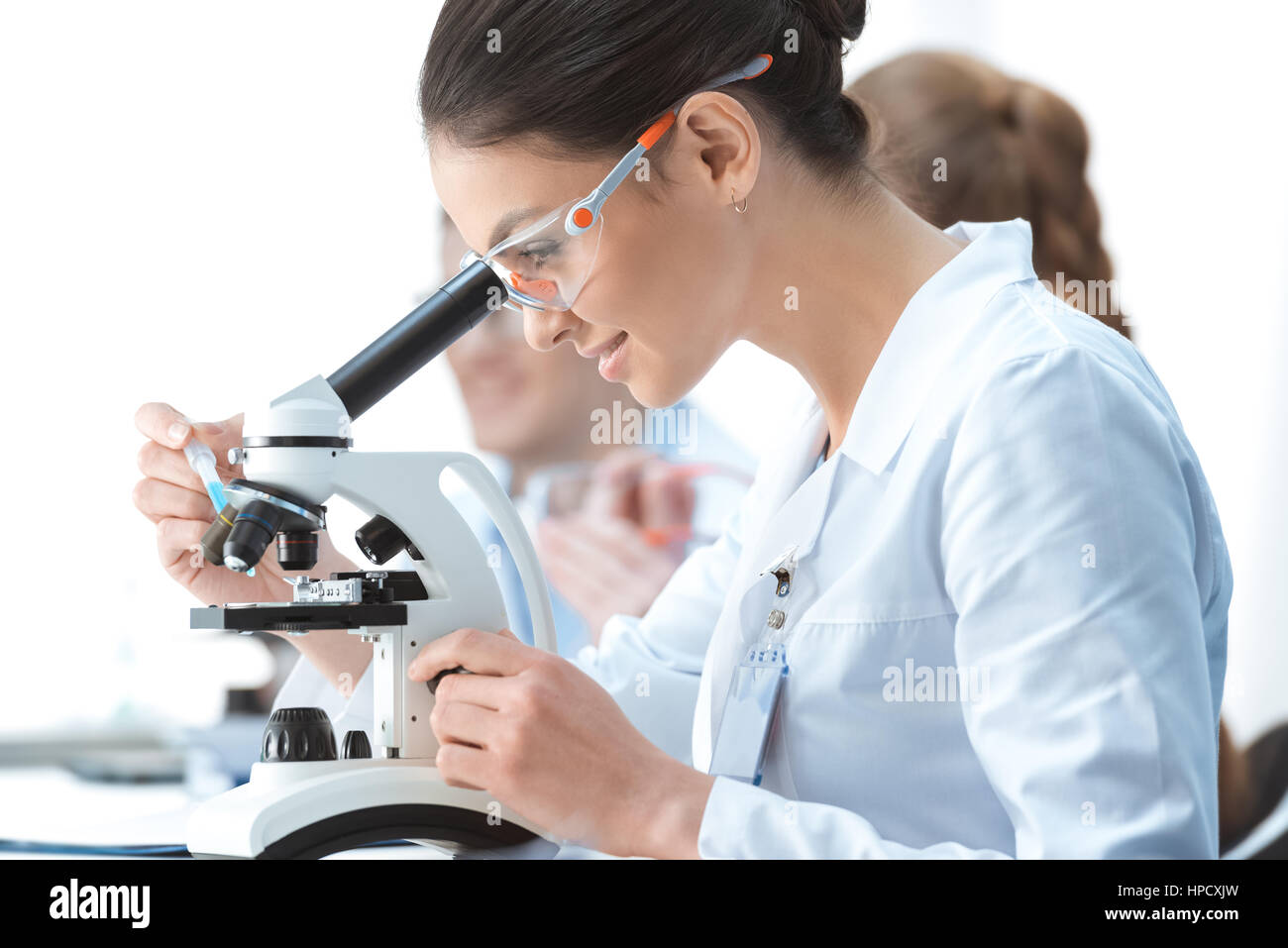 Lab scientist profile hi-res stock photography and images - Alamy