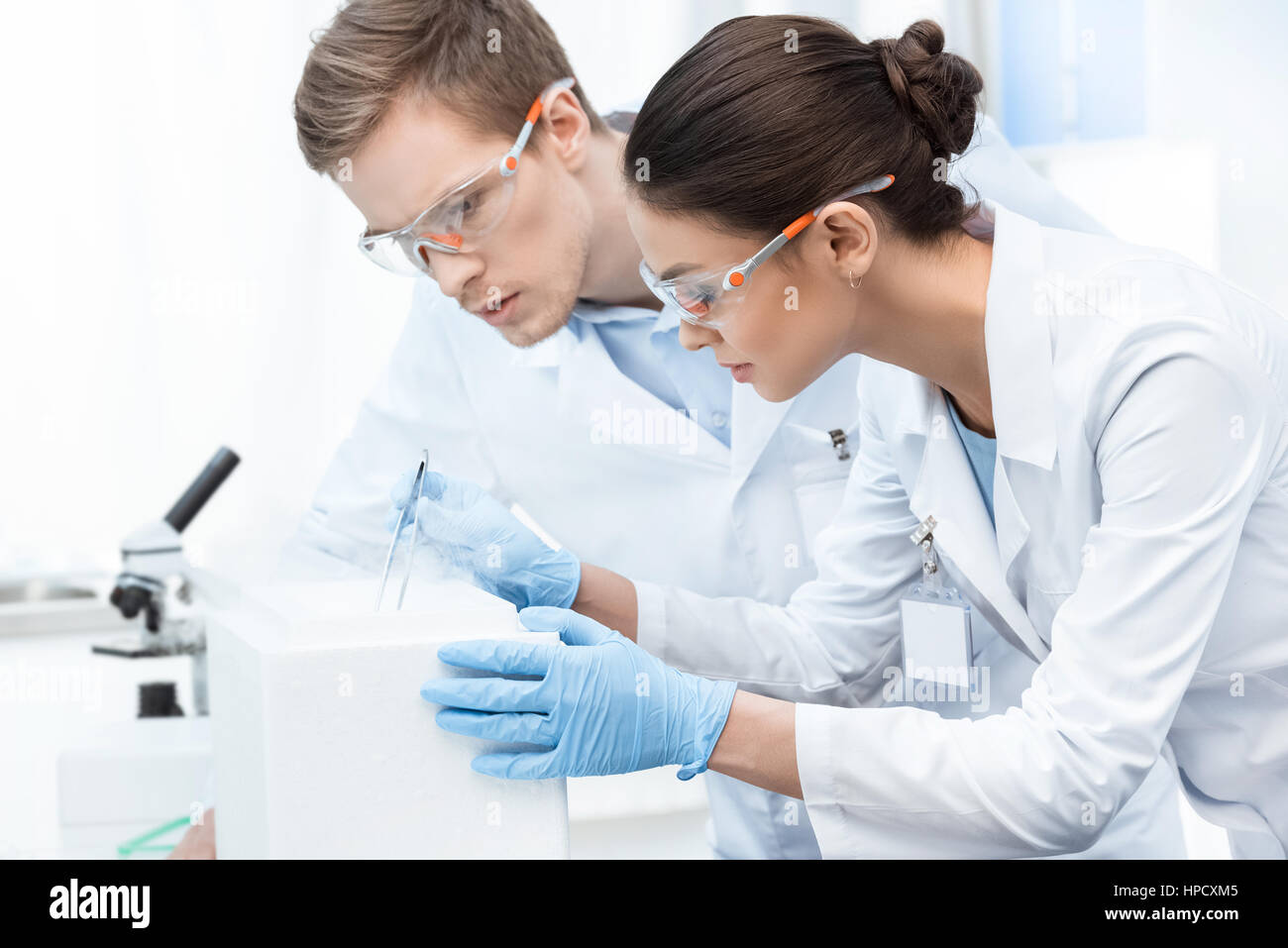 Professional chemists working in lab hi-res stock photography and ...