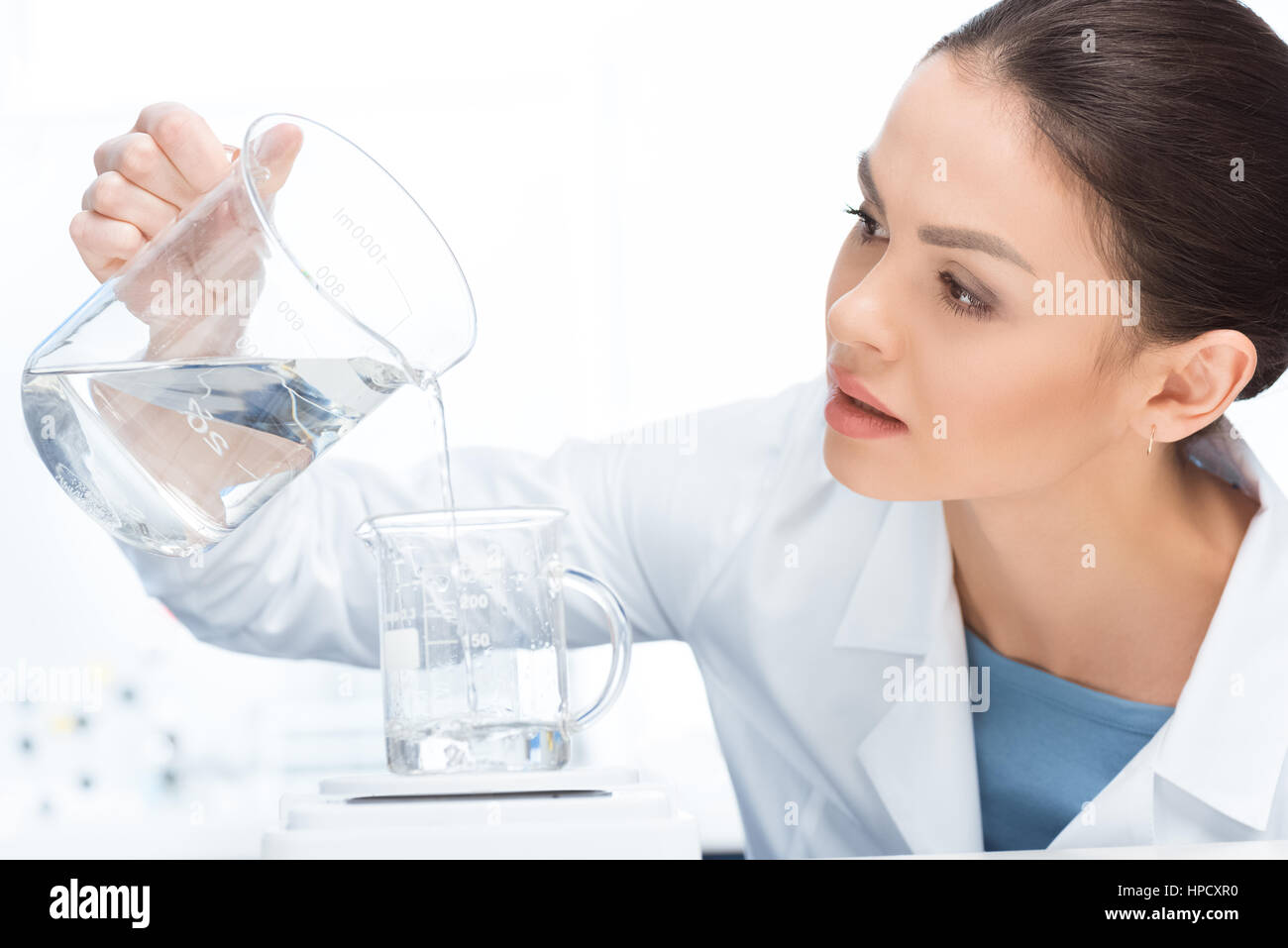 Side view concentrated scientists hi-res stock photography and images ...