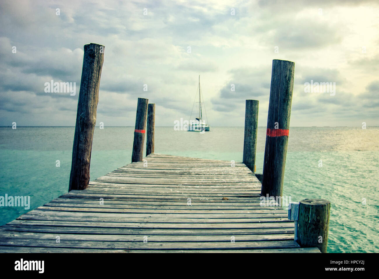 Distant sail boat hi-res stock photography and images - Alamy