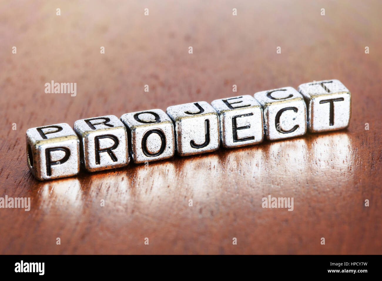 project letters placed on a desk in precious wood Stock Photo - Alamy