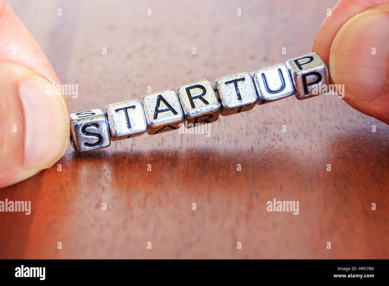 Start up business finance concept with metal letters Stock Photo - Alamy