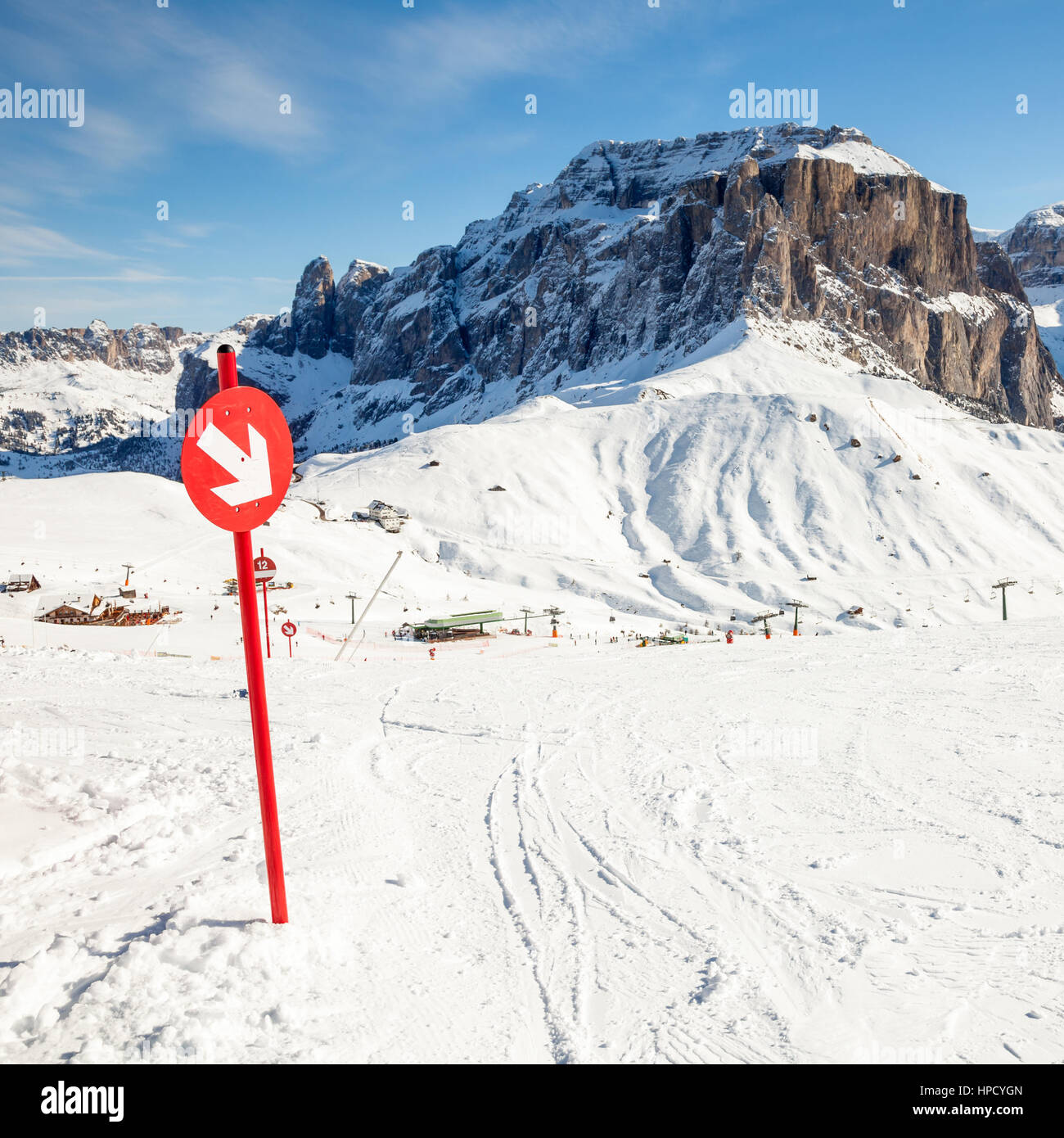 Red post sign marking the edge of ski slope Stock Photo - Alamy