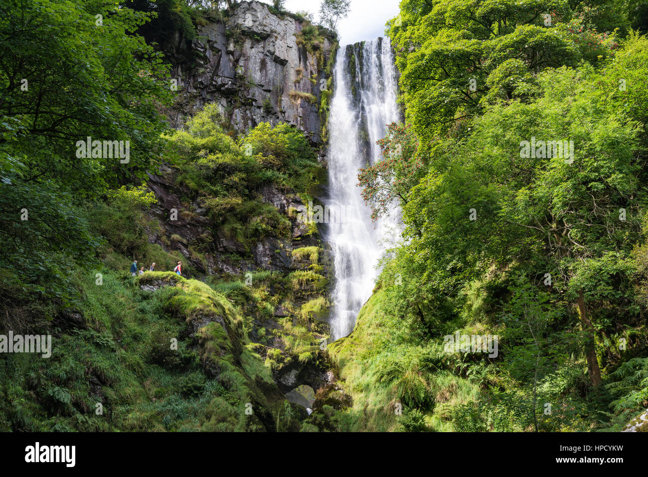 Tourists dwarfed by the falls at Pistyll Rhaeadr Stock Photo - Alamy