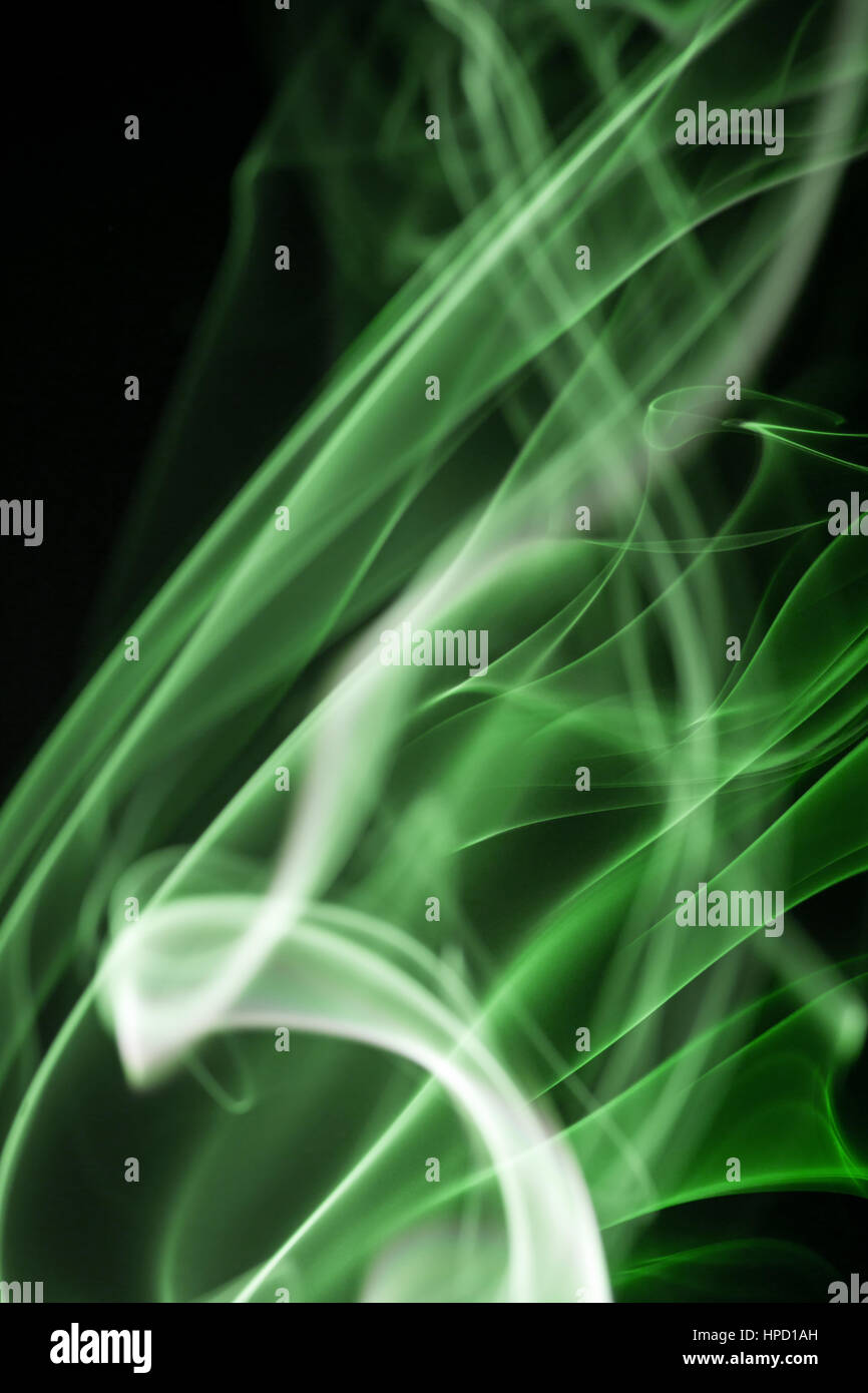 Colored smoke isolated on a black background Stock Photo - Alamy