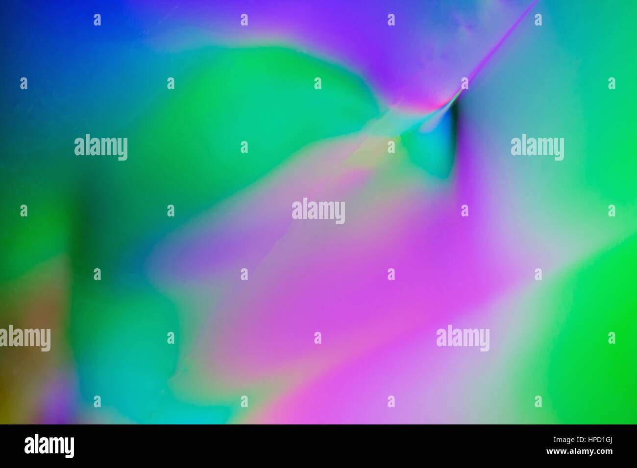 Colorful psychedelic blur showing stress distribution in plastic using ...