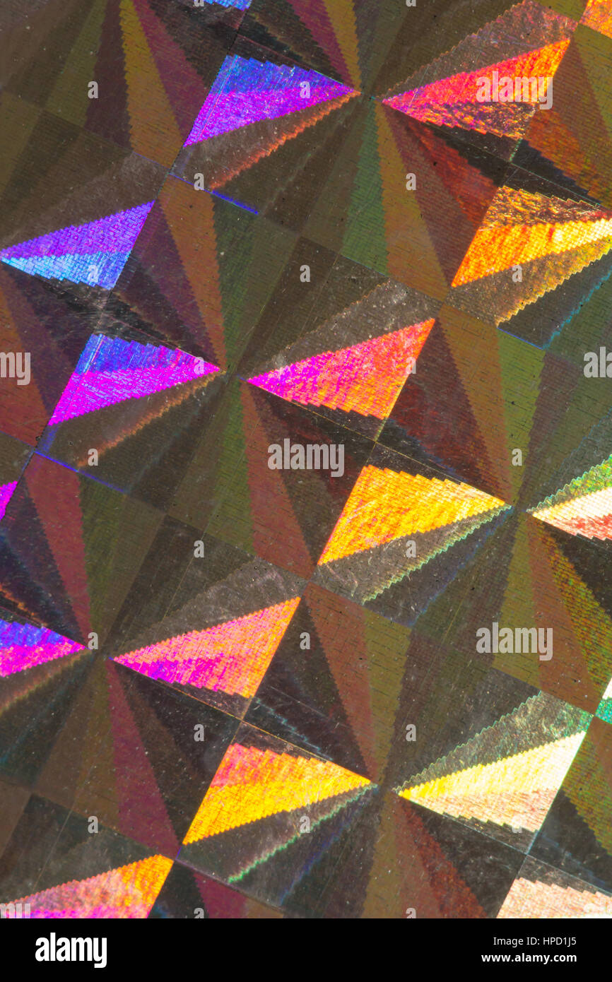 Psychedelic abstract formed by light reflecting off a textured metal ...