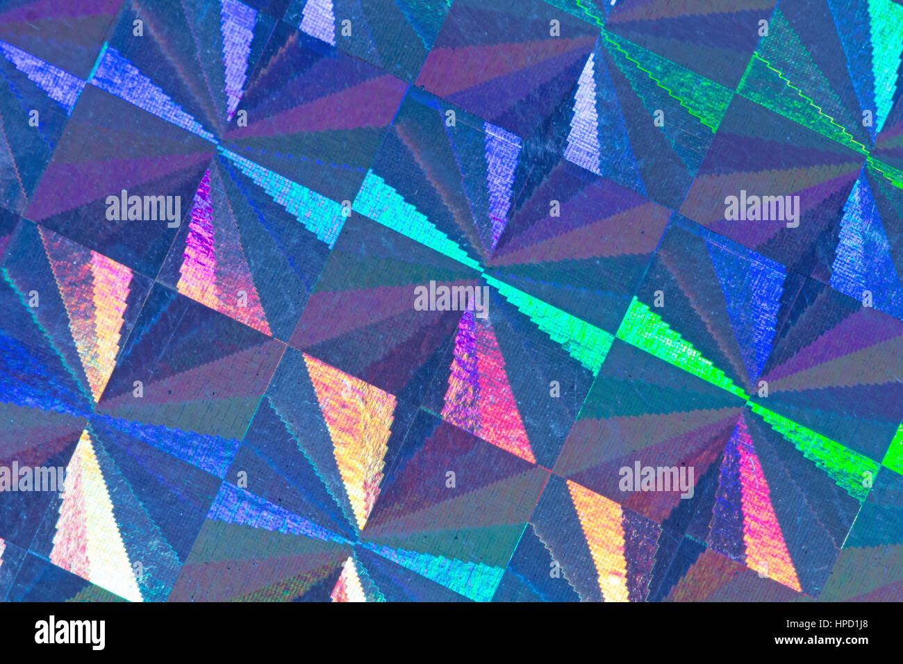 Psychedelic abstract formed by light reflecting off a textured metal ...