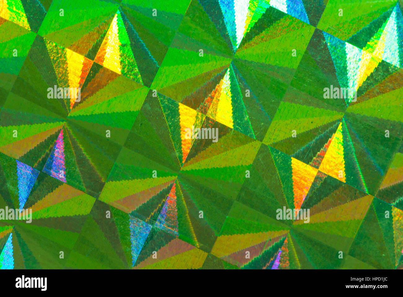 Psychedelic abstract formed by light reflecting off a textured metal ...