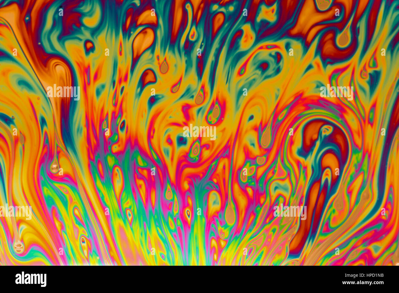 Psychedelic abstract made by light reflecting off of a soap bubble ...