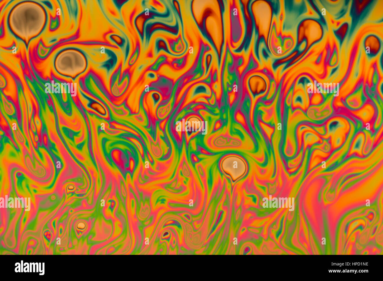 Psychedelic abstract made by light reflecting off of a soap bubble ...