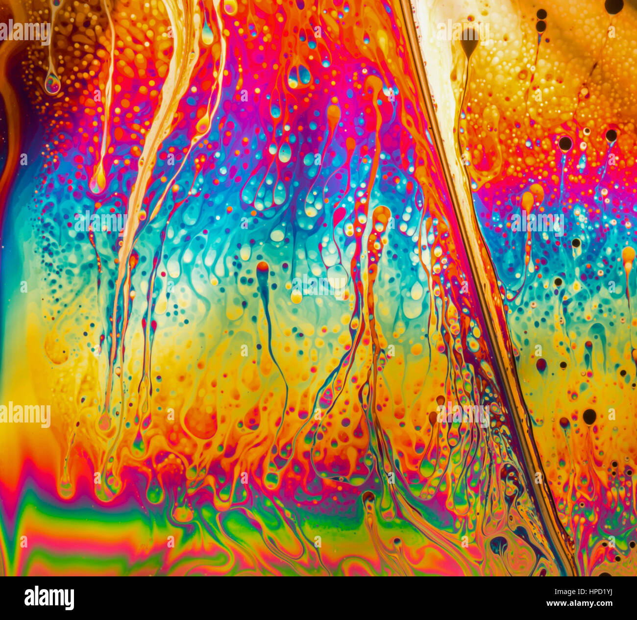 Psychedelic abstract background formed by soap bubble reflecting light ...