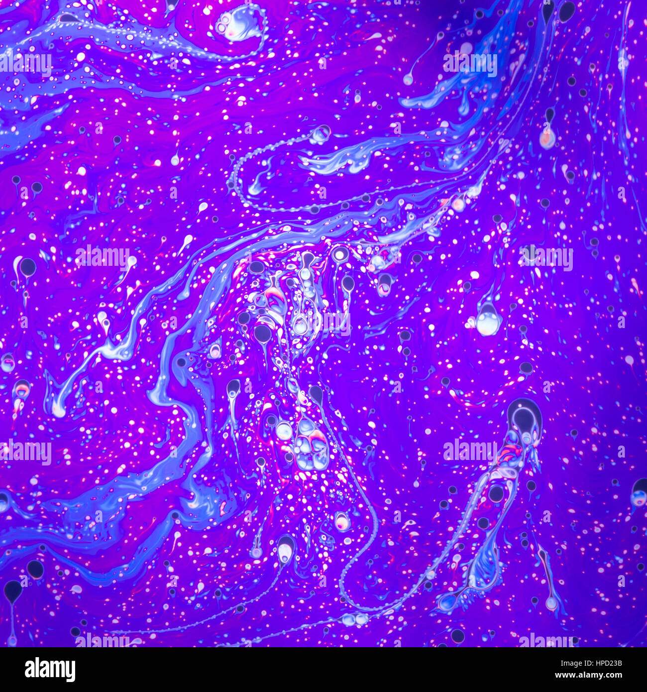 Psychedelic abstract formed by light on the surface of a soap bubble ...