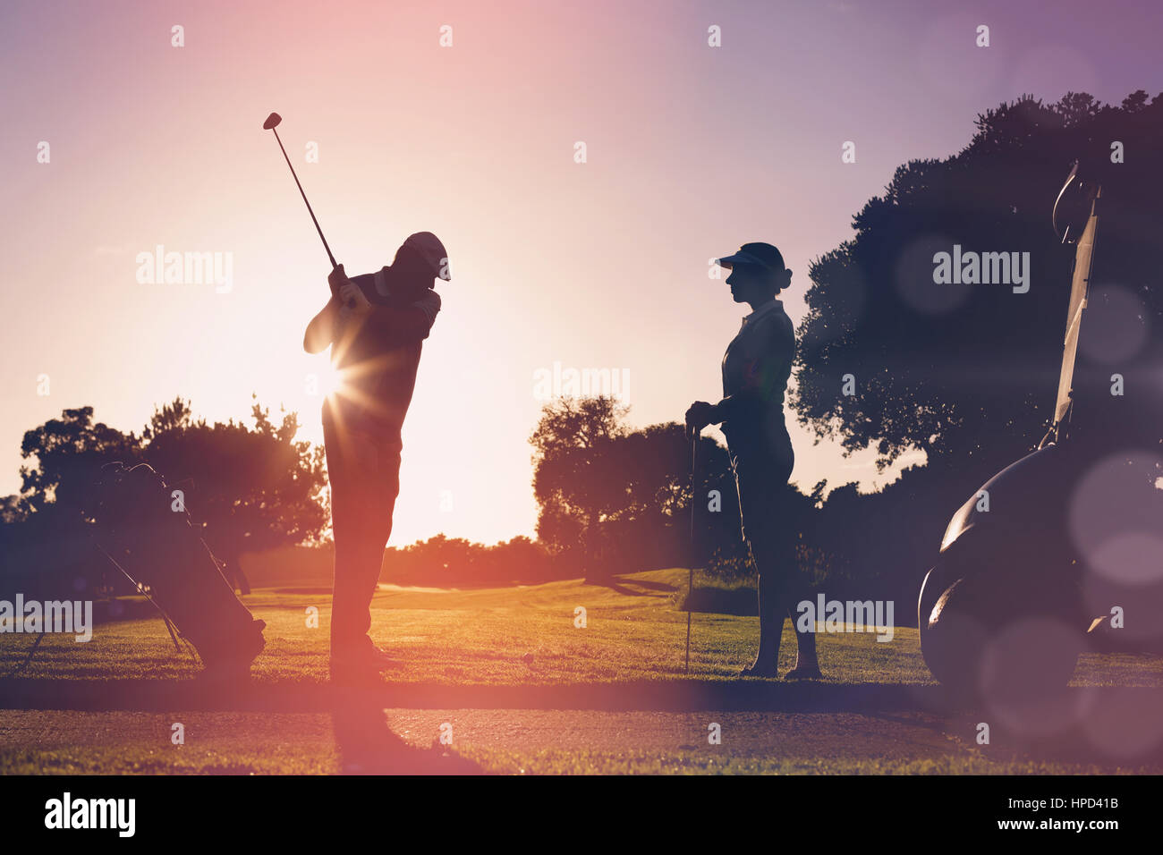 Side view woman playing golf hi-res stock photography and images - Alamy