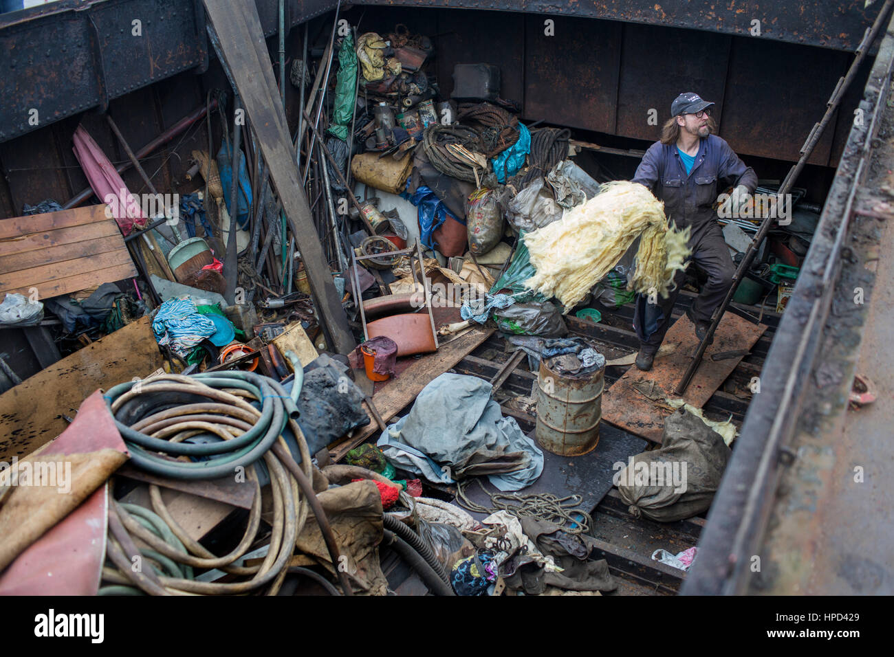 man with a collecting disorder has gathered a ship full of garbage (not ...
