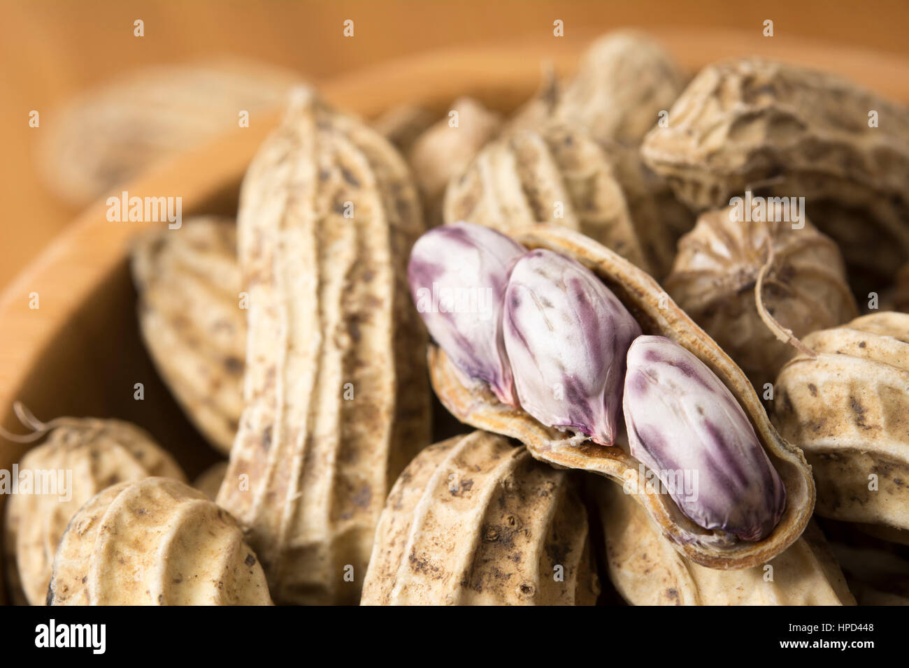Peanuts in wooden bowl hi-res stock photography and images - Alamy