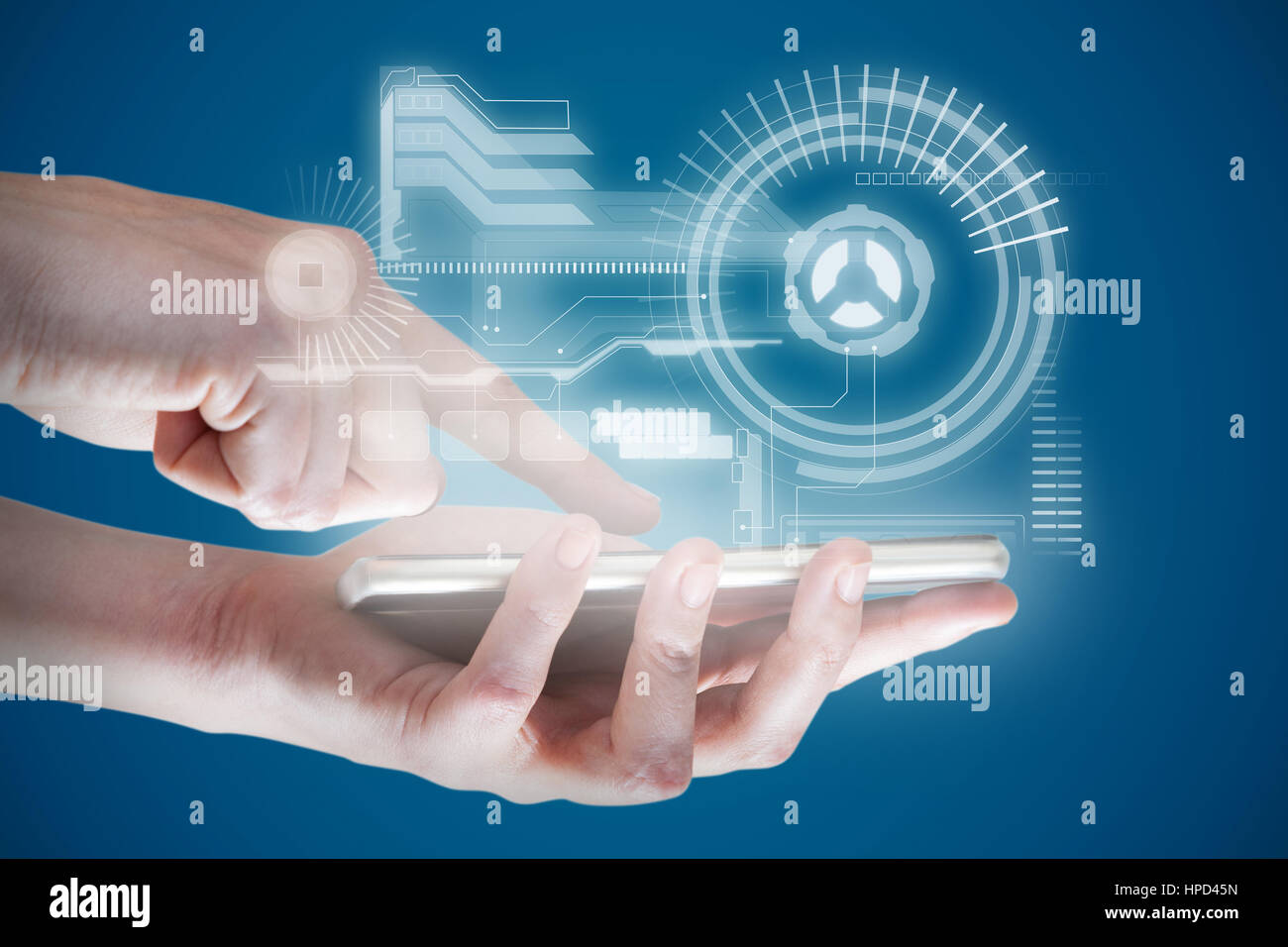 Hands using mobile phone on white background against blue Stock Photo ...