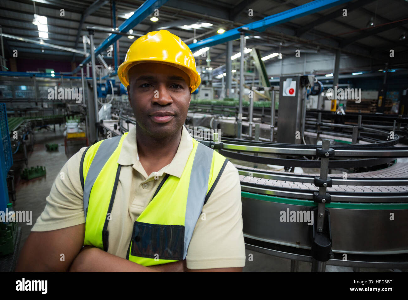 Portrait of confident factory worker at drinks production plant Stock ...