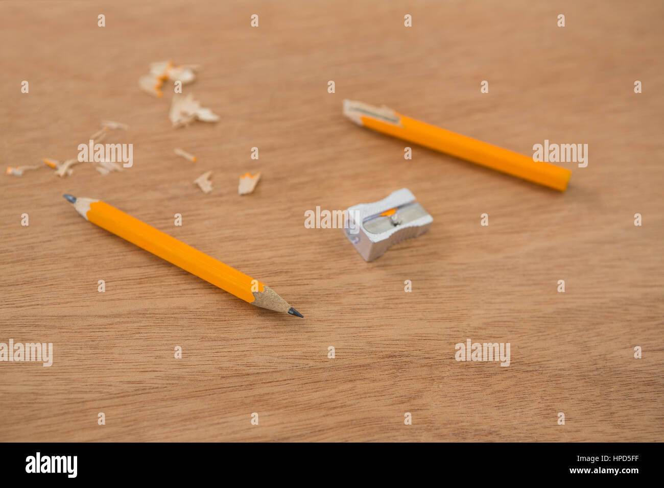 Broken yellow pencil with sharpener on wooden background Stock Photo ...