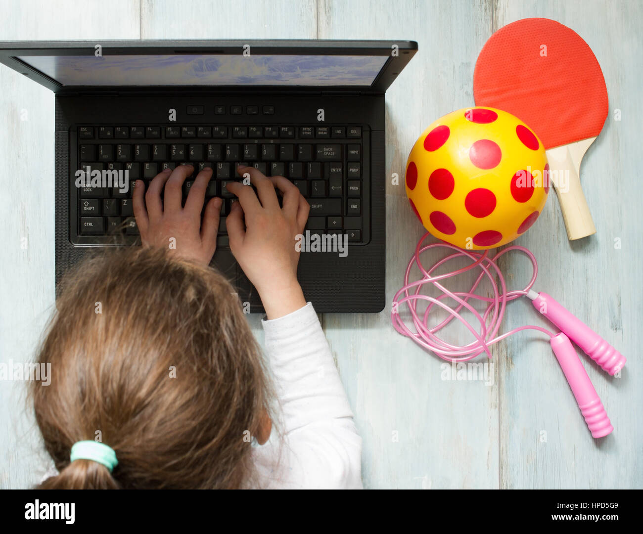 Internet addiction and computers concept with kid and laptop Stock ...