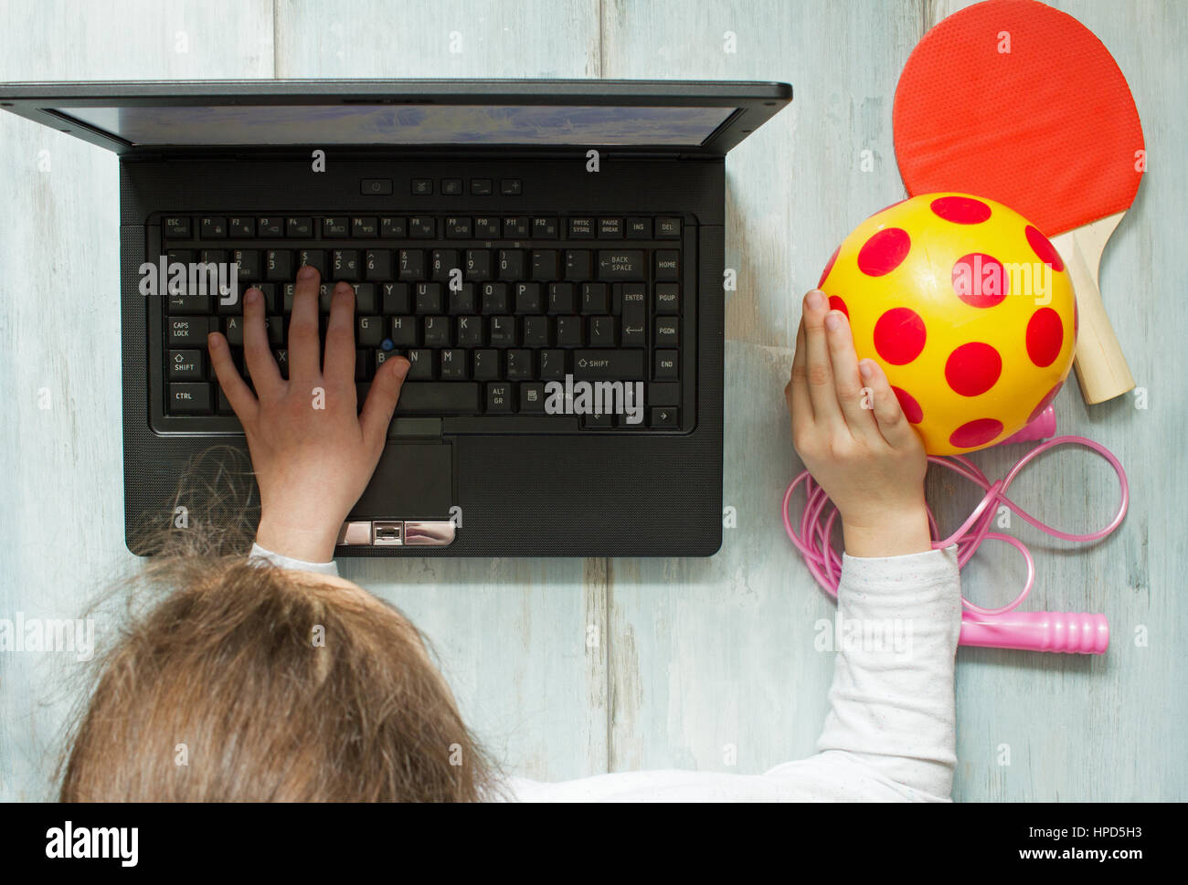 Internet addiction and computers concept with kid and laptop Stock ...