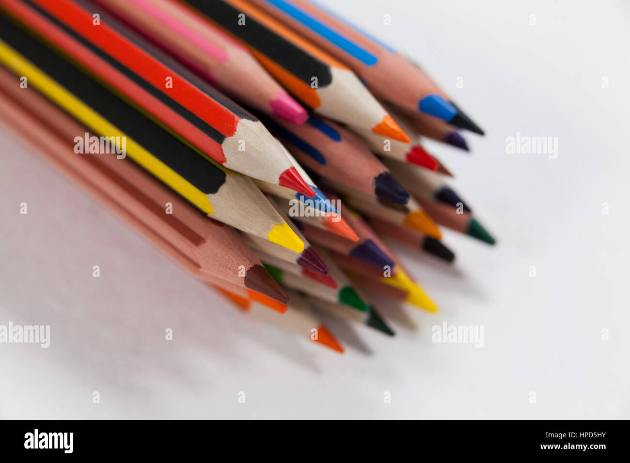 Bunch of colored pencil on white background Stock Photo - Alamy