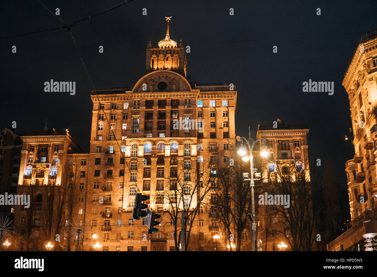 illuminated facade of a large old building at night Stock Photo - Alamy