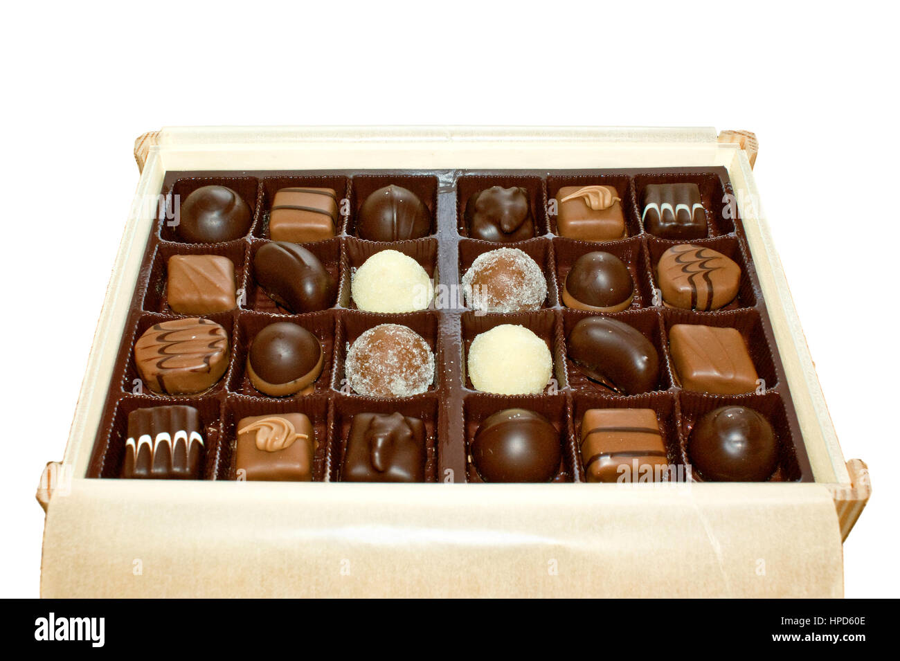 Chocolates in a wooden box isolated Stock Photo - Alamy