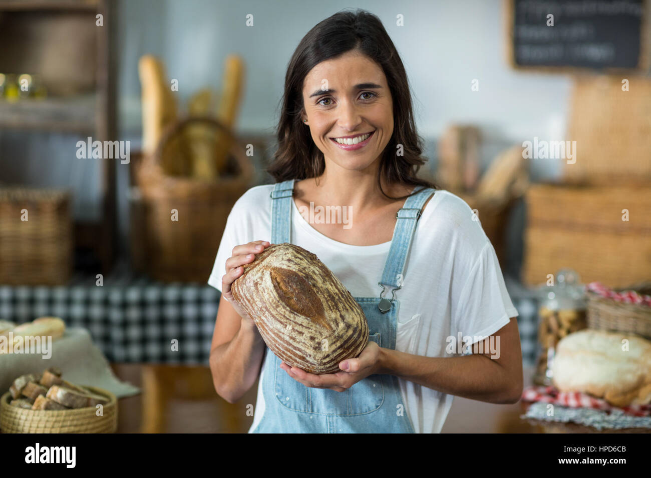 Woman Holding Loaf Of Bread Hi Res Stock Photography And Images Alamy