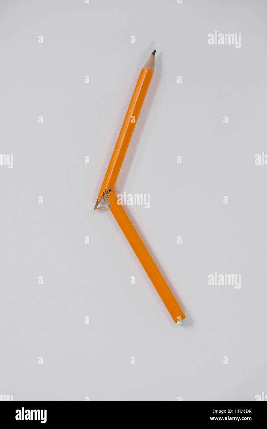 Close-up of broken pencil on white background Stock Photo - Alamy