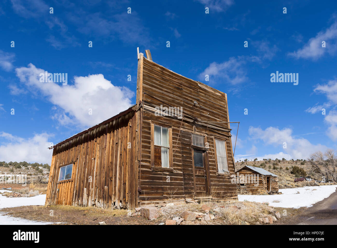 Old weathered Ghost Town buildings in the desert during winter with ...