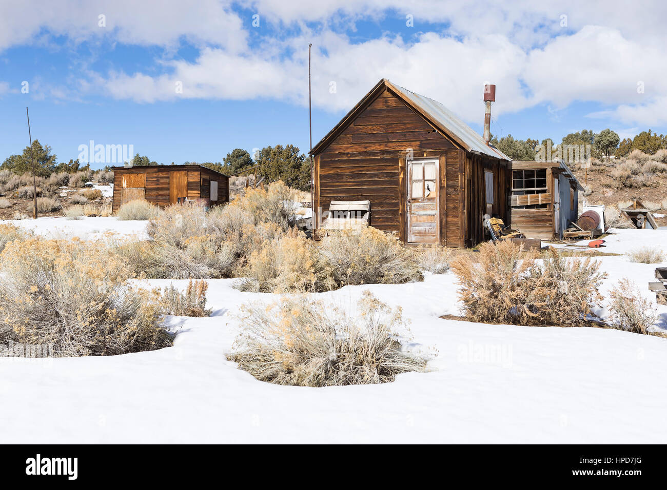 Old weathered Ghost Town buildings in the desert during winter with ...