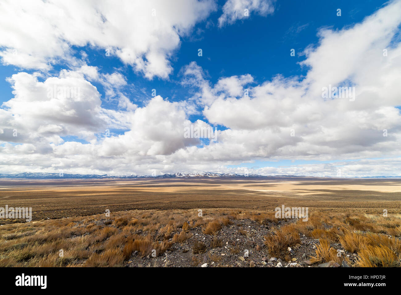 Wide open empty desert landscape in Nevada during winter with blue ...