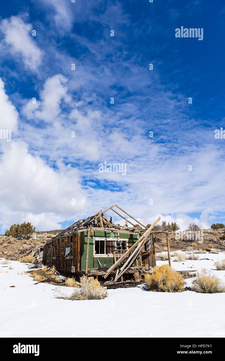 Old weathered Ghost Town buildings in the desert during winter with ...